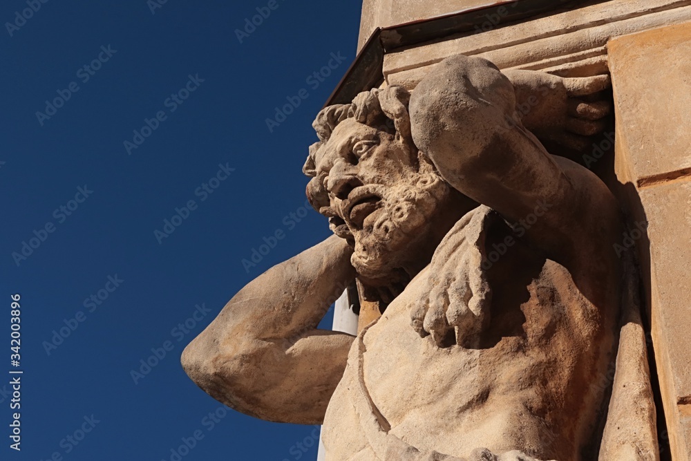 Statue of blacksmith Juraj Corgon, as Atlant supporting corner of ...