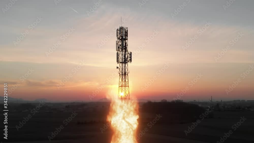 5g telecom antenna tower on fire after a riot during the pandemic ...