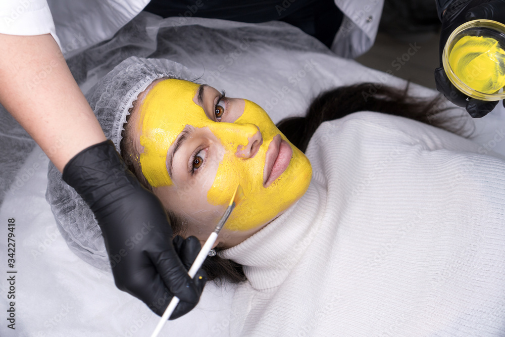 Foto de Beauty salon, facial peeling mask with retinol treatment and ...