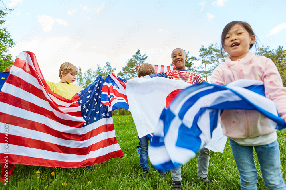 Children with flags in the international kindergarten Stock Photo ...