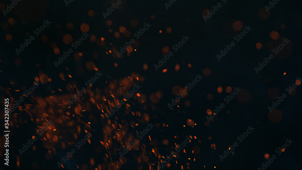 Fire sparks on black background Stock Photo | Adobe Stock