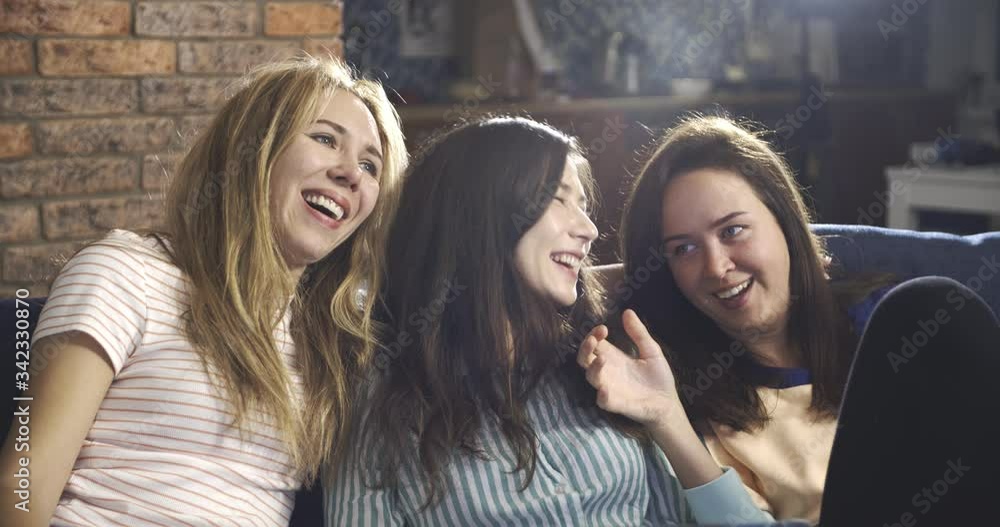 Three girls discussing rumors at home party. Friendship, relation ...