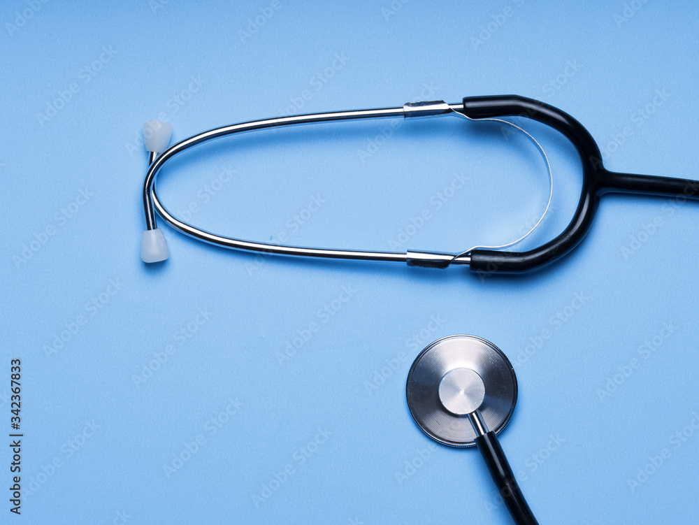 Modern stethoscope with one-sided head chestpiece with diaphragm on a ...