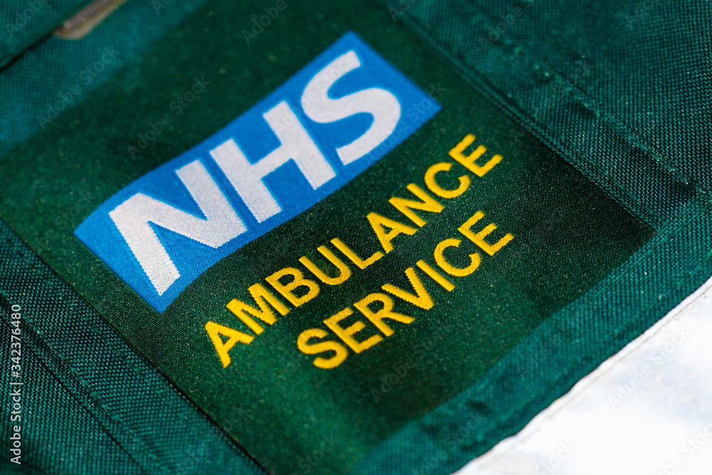 Kent, UK. 11th April 2020. Close up, angled view of a British paramedic ...