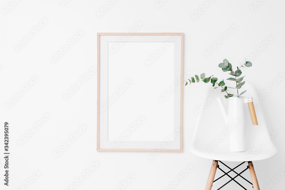 Large wooden oak frame mockup on white wall. Simple modern interior ...