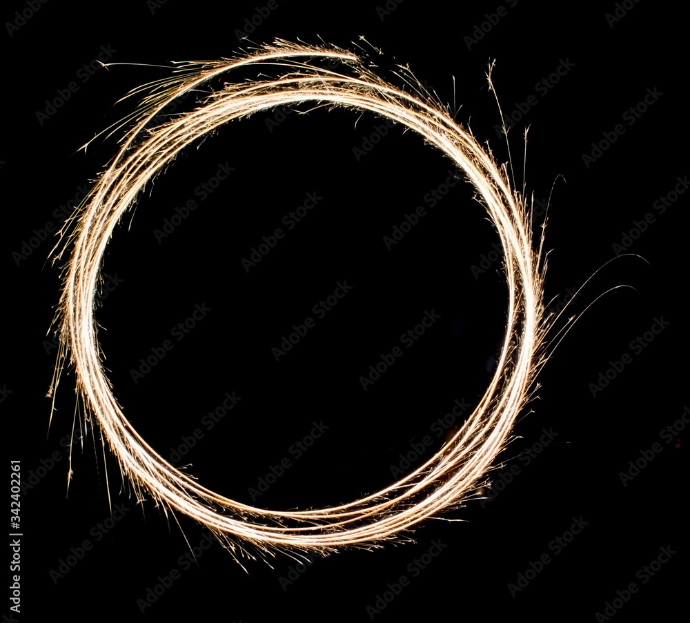 circle symbol by light painting with fireworks in isolated natural ...