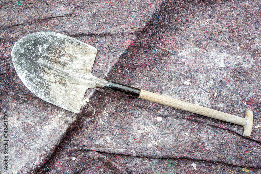 Foto de Pala para trabajos de albañilería con cemento do Stock | Adobe ...