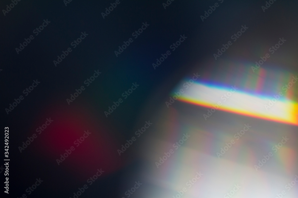 Sun reflection over a piece of crystal for a colorful lens flare on ...