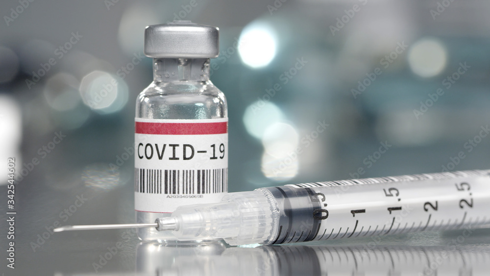 Coronavirus Covid-19 vaccine vial in medical lab with syringe Stock Photo | Adobe Stock