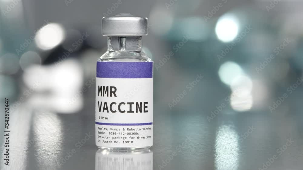 MMR measles, mumps, and rubella vaccine vial in medical lab with ...
