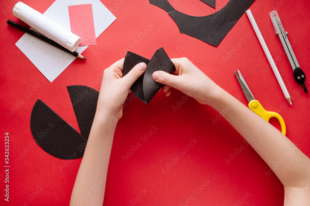 How to make bat out of paper at home. Hands making craft out of paper ...