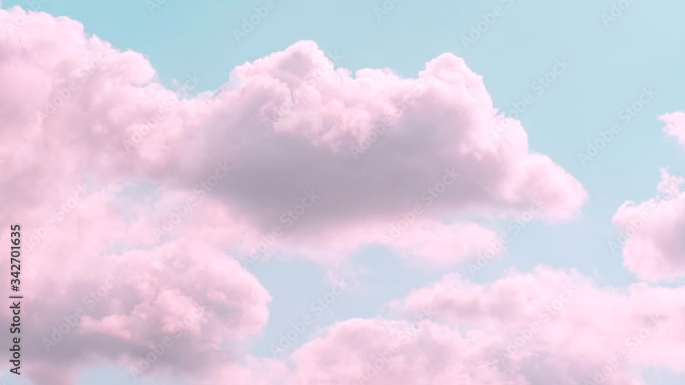 Motions clouds. Puffy fluffy beautiful pink clouds on turquise sky time ...