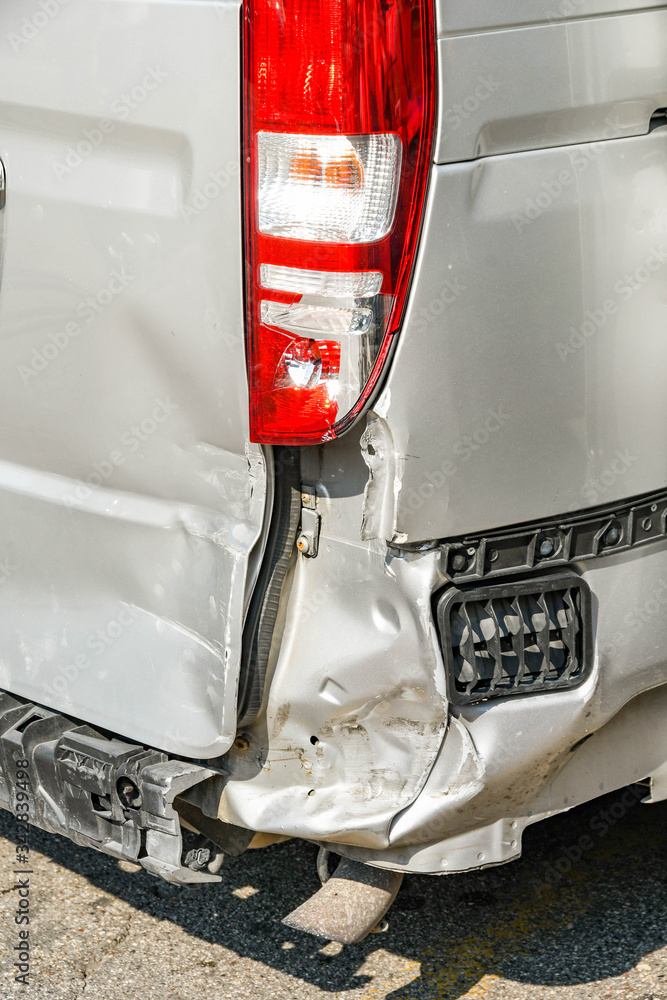 Damaged rear end and lights of a vehicle after an accident Stock Photo ...