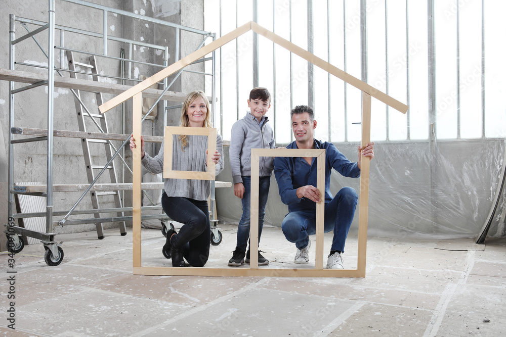 New building residential house purchase apartment concept. Happy family ...