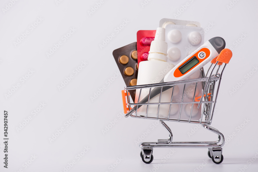Prevention vitamins concept. Close up photo of shopping cart full of ...
