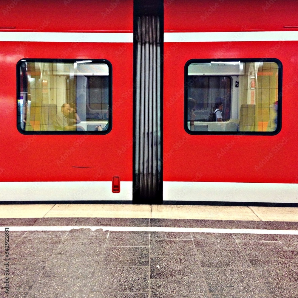 Red Train At Railroad Station Stock Photo | Adobe Stock