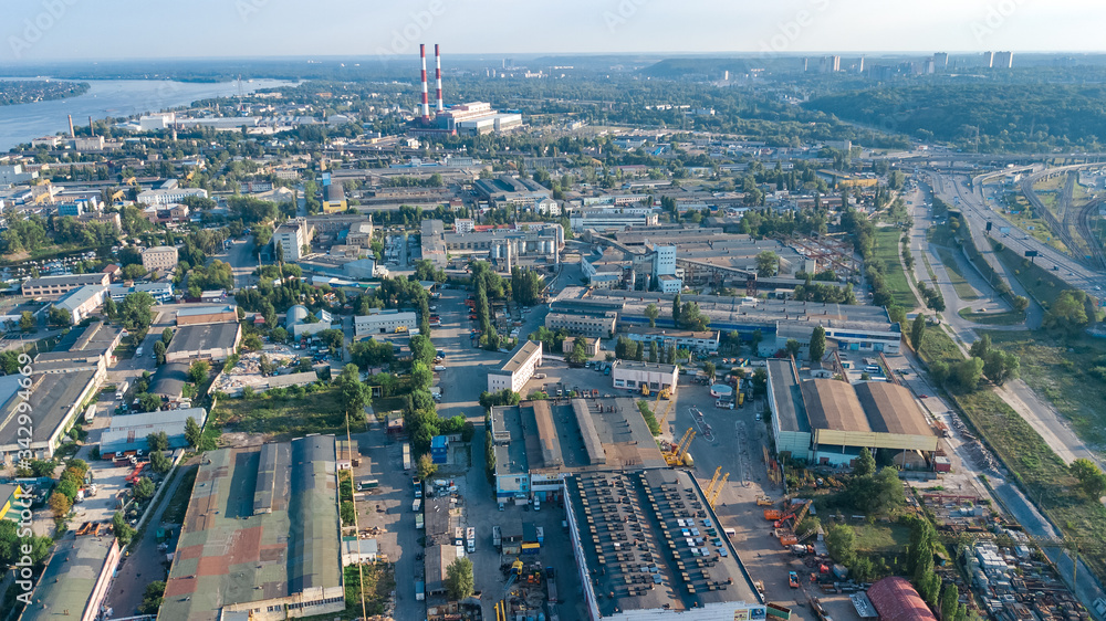 Aerial top view of industrial park zone from above, factory chimneys ...