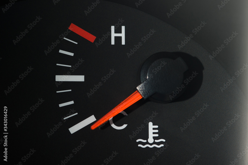 The car's coolant temperature indicator on the dashboard, a little ...