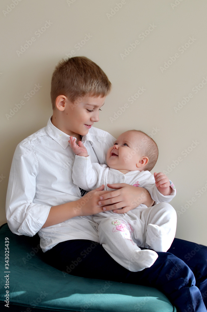Big brother and his little baby sister. Friendship between brother and ...