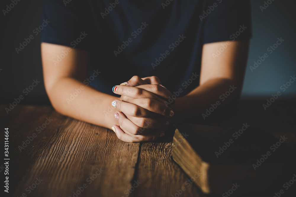 Praying hands of teen girl Stock Photo | Adobe Stock