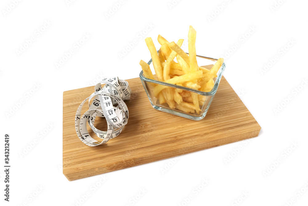 French fries in a glass plate. Bamboo board. White background. Isolated ...