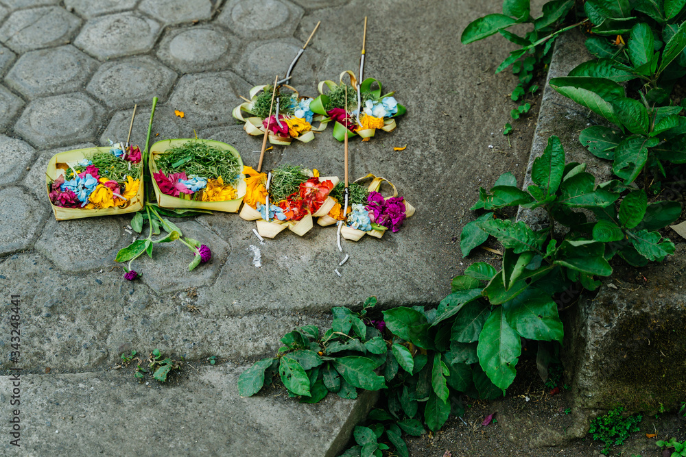 Balinese traditional Canang Sari offerings made out of flower petals ...