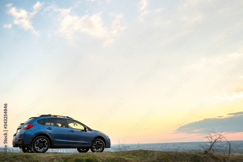 Landscape with blue off road car at sunset, Traveling by auto ...
