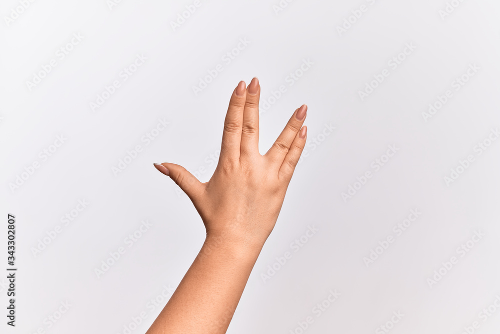 Hand of caucasian young woman greeting doing Vulcan salute, showing ...