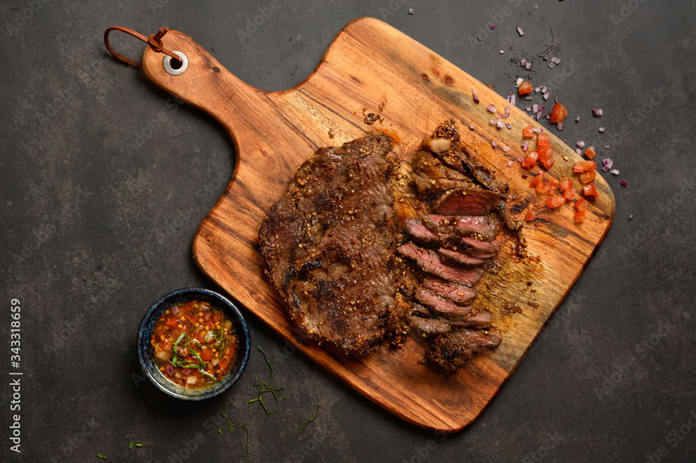 Thai-style grilled beef with Thai spicy sauce. The hot dipping sauce is ...