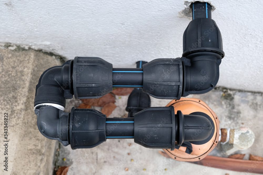 HDPE water piping installation connecting the outside mains water ...
