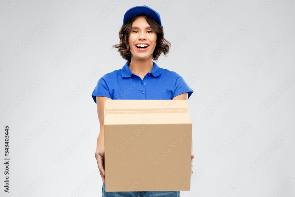 mail service and shipment concept - happy smiling delivery girl with ...