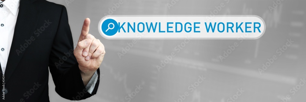 Foto de Knowledge Worker. Man in a suit points a finger at a search box. The word Knowledge ...