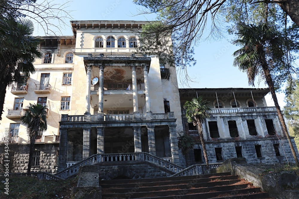 Entrance to a dilapidated multi-storey building Stock Photo | Adobe Stock