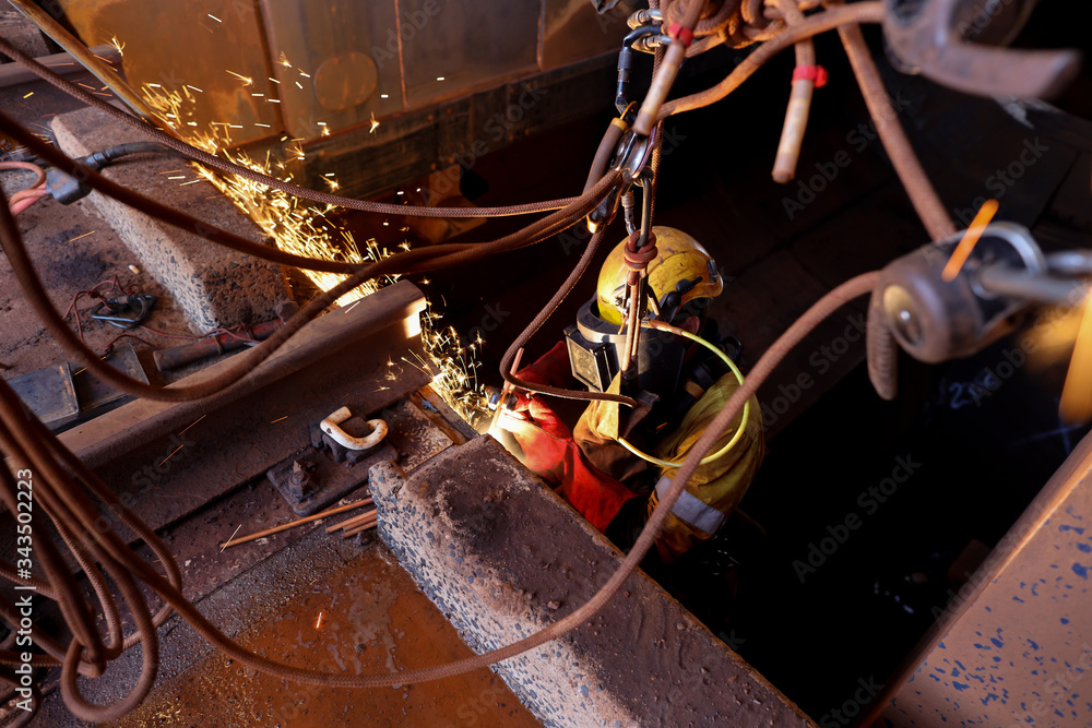 Safe work practices rope access abseiler worker wearing a fall ...