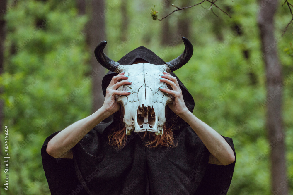 Foto de Victim with skull of the animal instead of head. Photo stylized ...