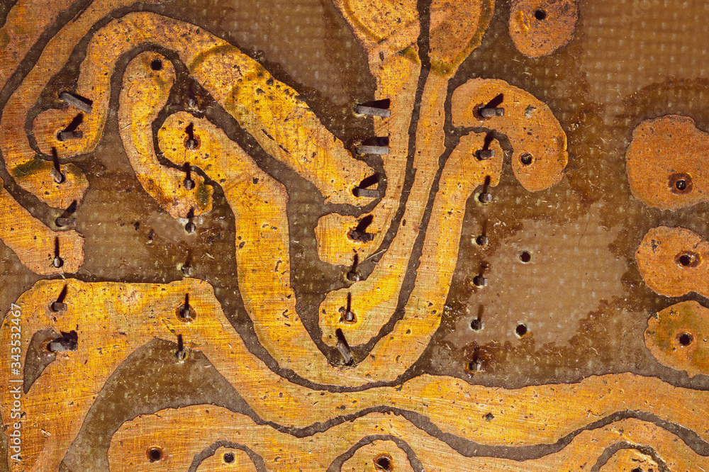 Handmade circuit board with copper tracks. industrial background ...