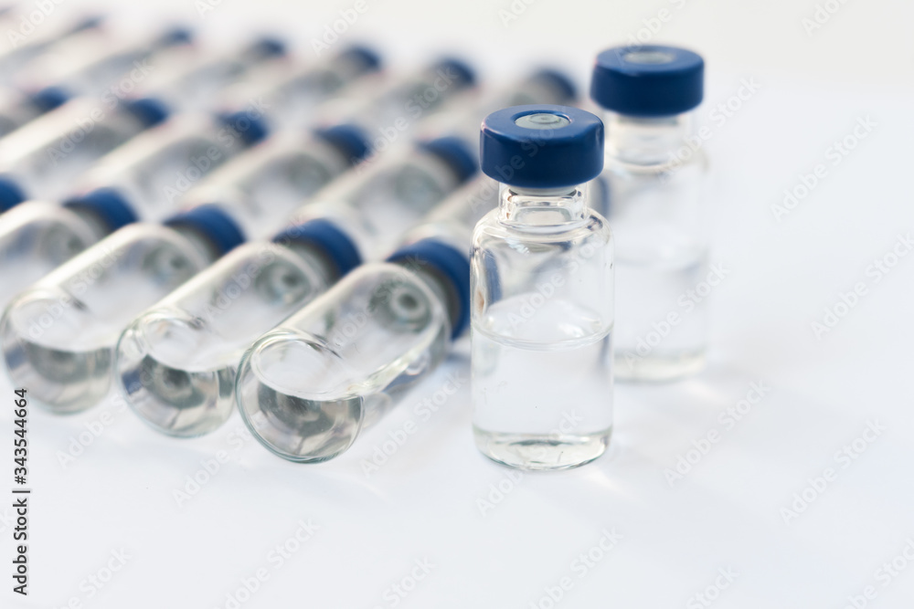 injection ampoules for vaccination on a white background, healthcare ...