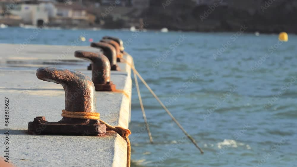 Rusty bollard. Corroded forged pillars for mooring ships and boats in ...