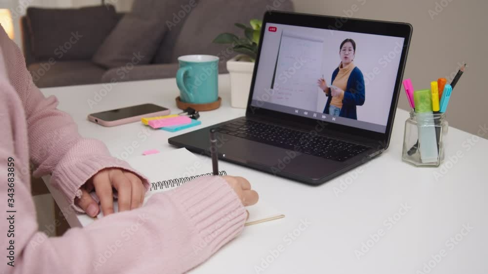 Slow motion Zoom in Shot : Side view of asian student learning ...