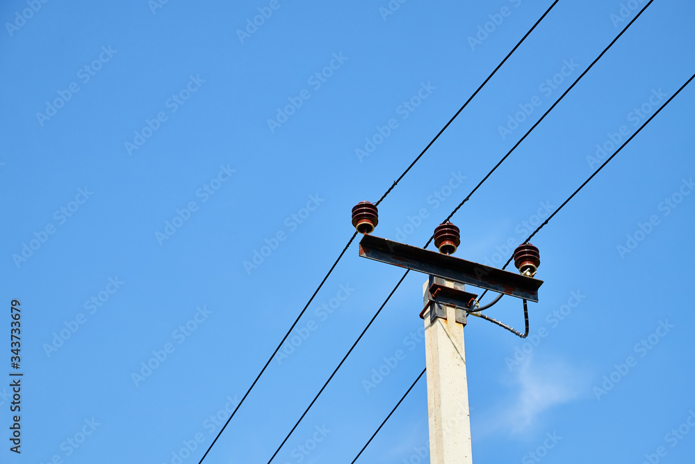Electric power lines and wires with blue sky. Support of power lines in ...