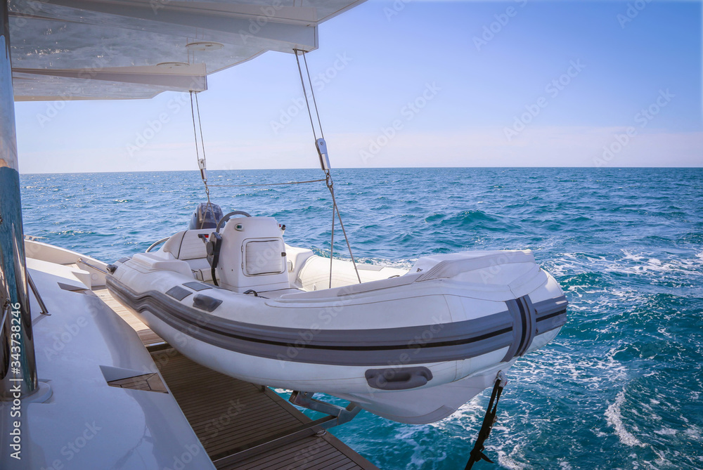 Fotografia do Stock: Light inflatable boat equipped with a motor or ...