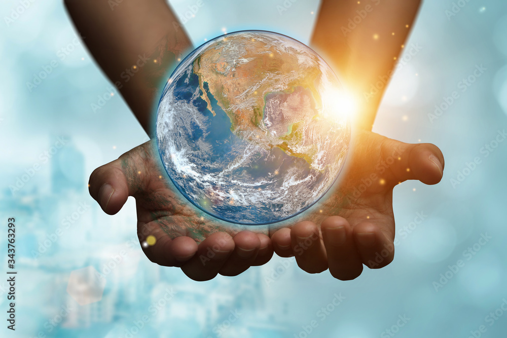 International Day of Forests and earth day concept: Hands holding blue ...