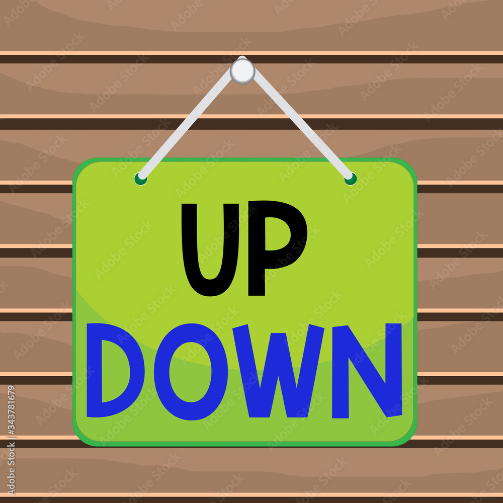 Conceptual hand writing showing Up Down. Concept meaning To look or to ...