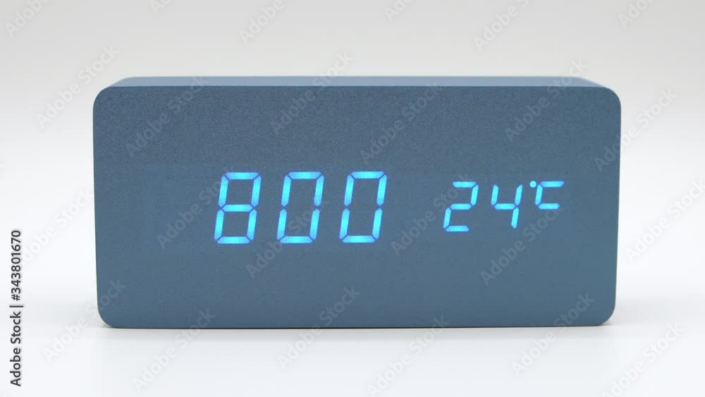 The digital alarm clock activates and rings at 8 am. 4K Stock ビデオ ...