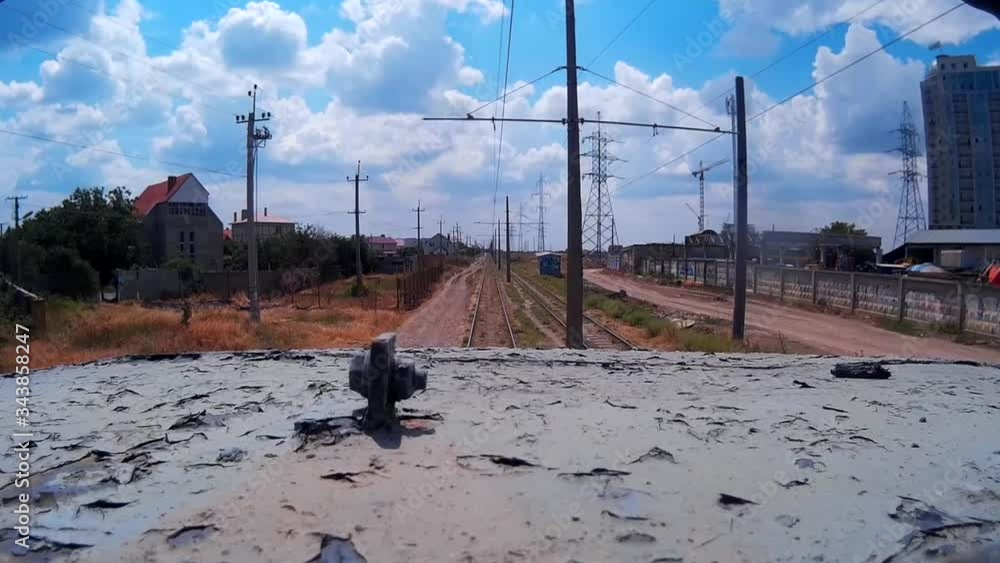 A ride on tram filmed on action camera. View from the roof of the tram ...