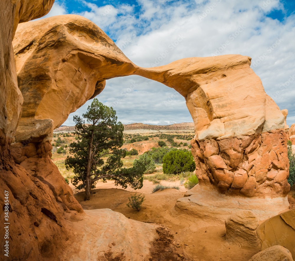 Metate Arch Stands Over the Landscape of Devils Rock Garden, Grand ...