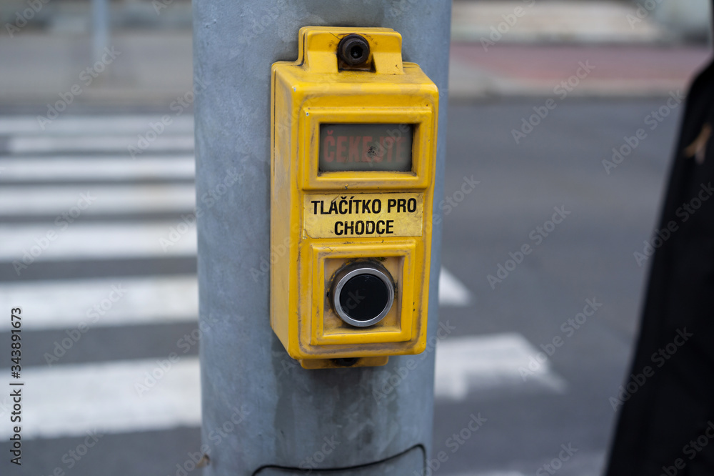Button at pedestrian crossing and traffic light. Traffic in the Czech ...