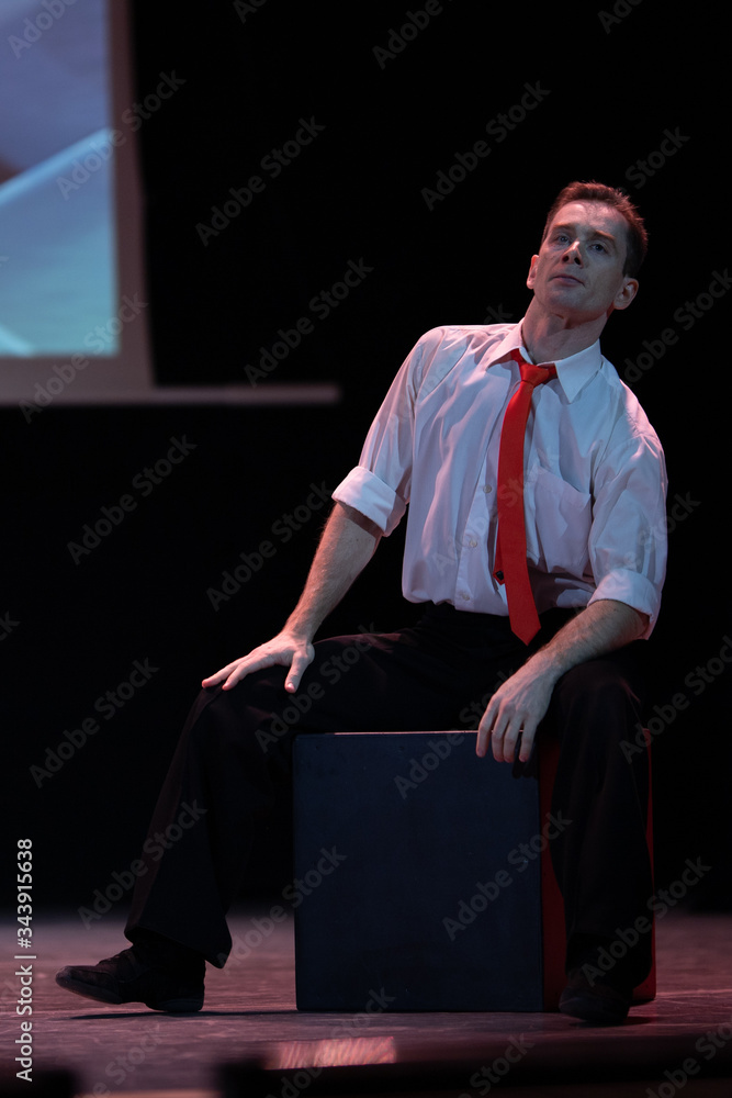 Male Dancers actors perform in the theater on stage in a dance show ...