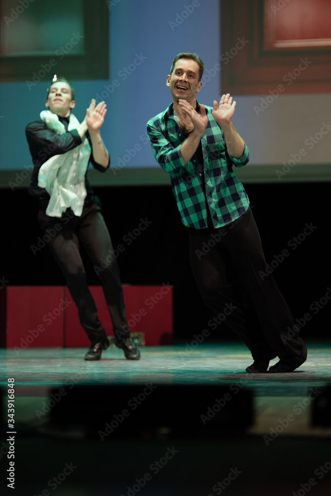 Dancers actors perform in the theater on stage in a dance show Stock ...