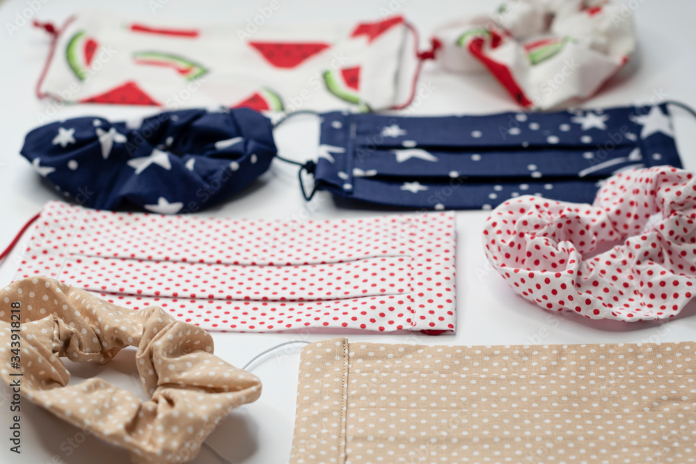 Selective focus on handmade cotton fabric face mask with matching ...